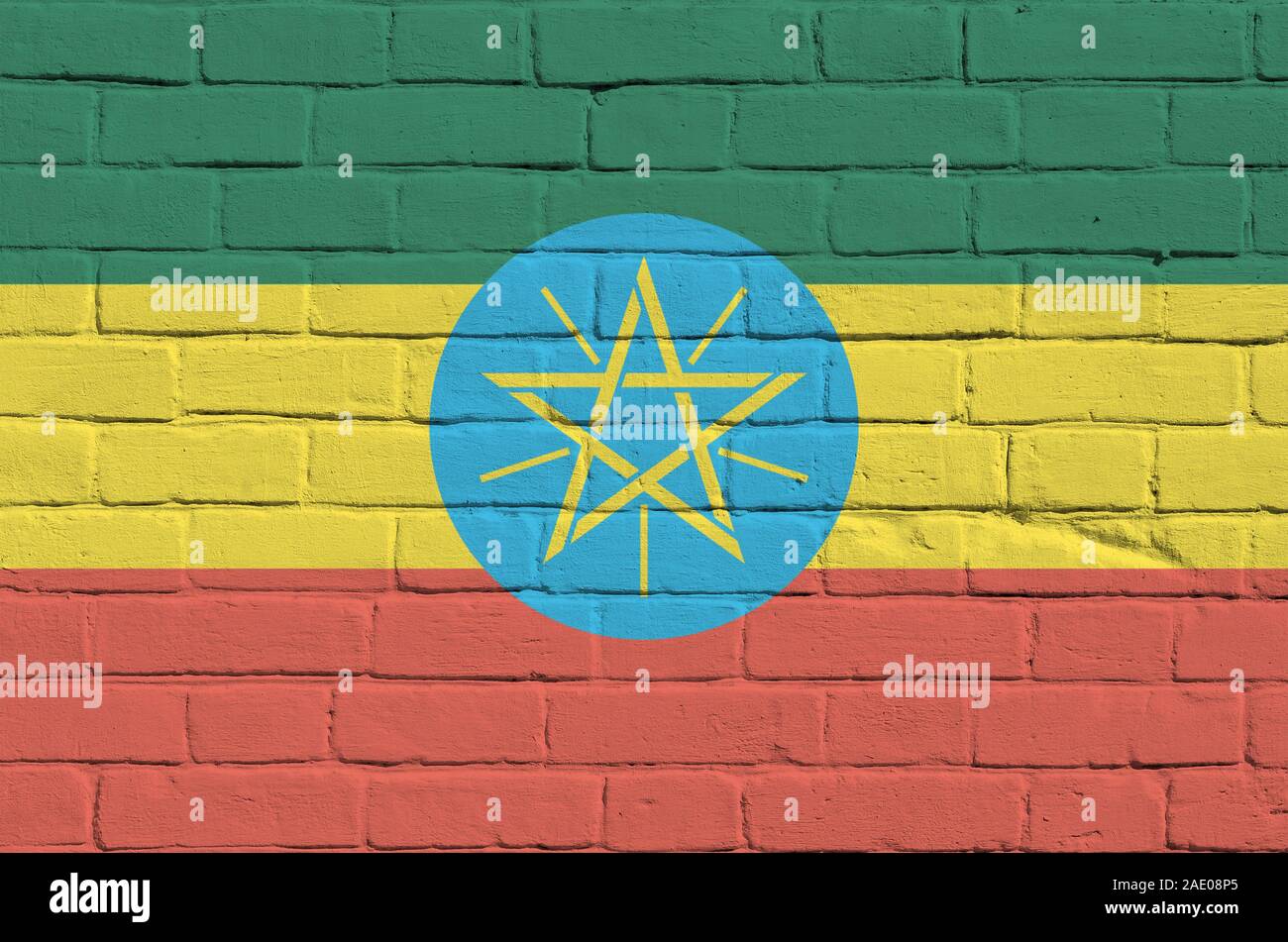 Ethiopia flag depicted in paint colors on old brick wall close up ...