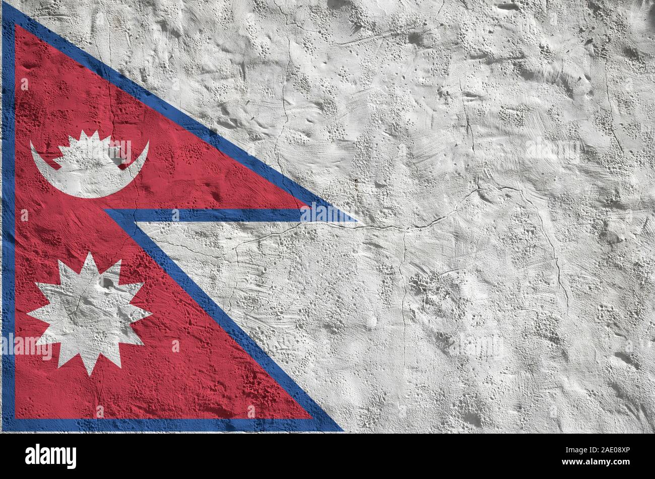 Nepal flag depicted in bright paint colors on old relief plastering ...