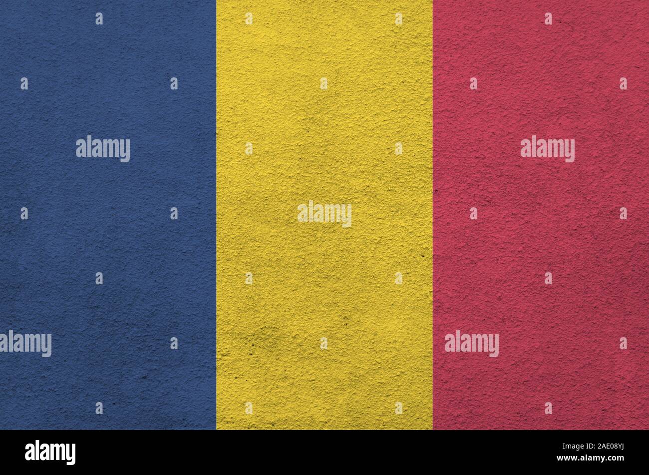 Chad flag depicted in bright paint colors on old relief plastering wall ...