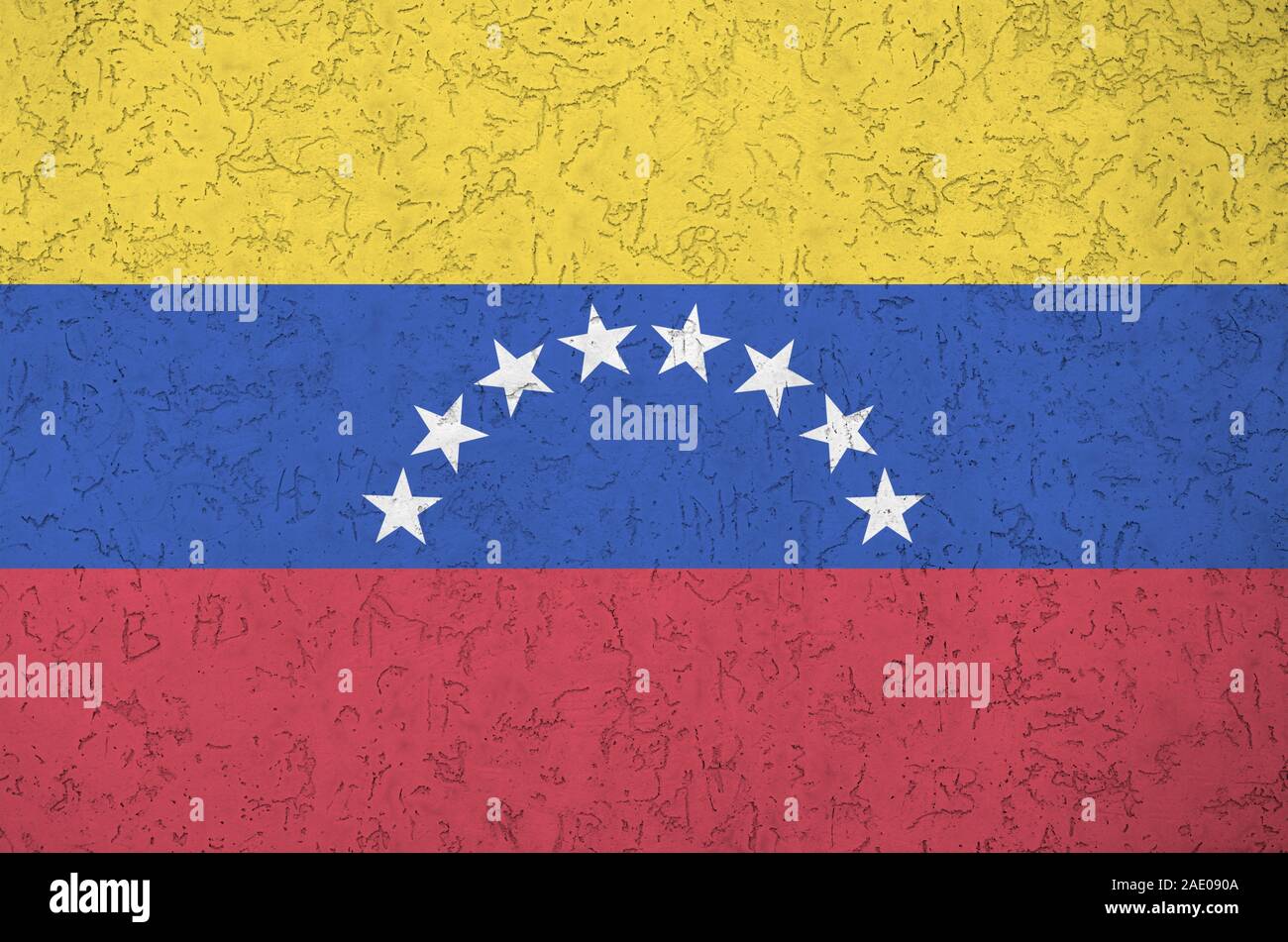 Venezuela flag depicted in bright paint colors on old relief plastering ...