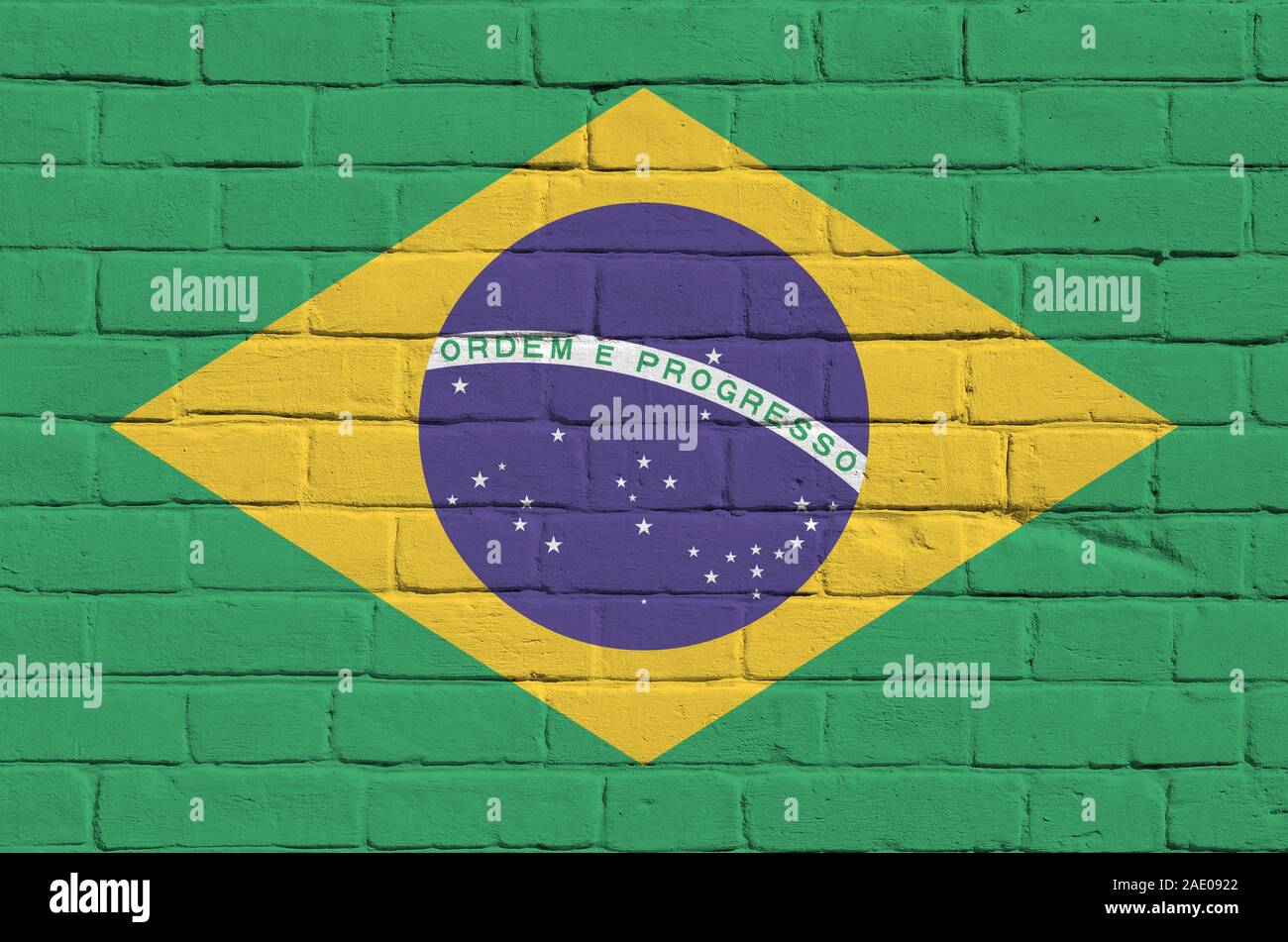 Brazil flag depicted in paint colors on old brick wall close up ...