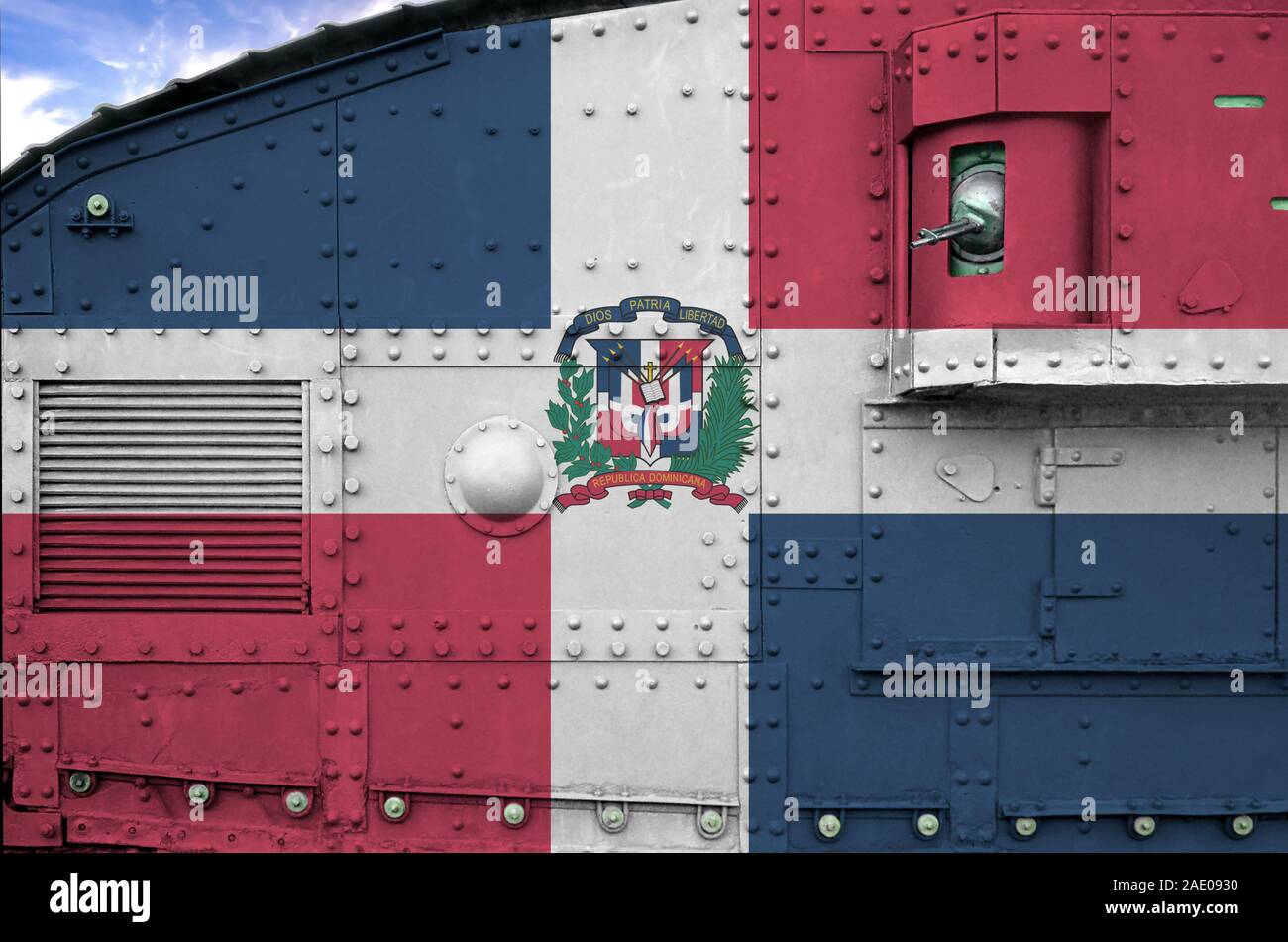 Dominican Republic flag depicted on side part of military armored tank ...