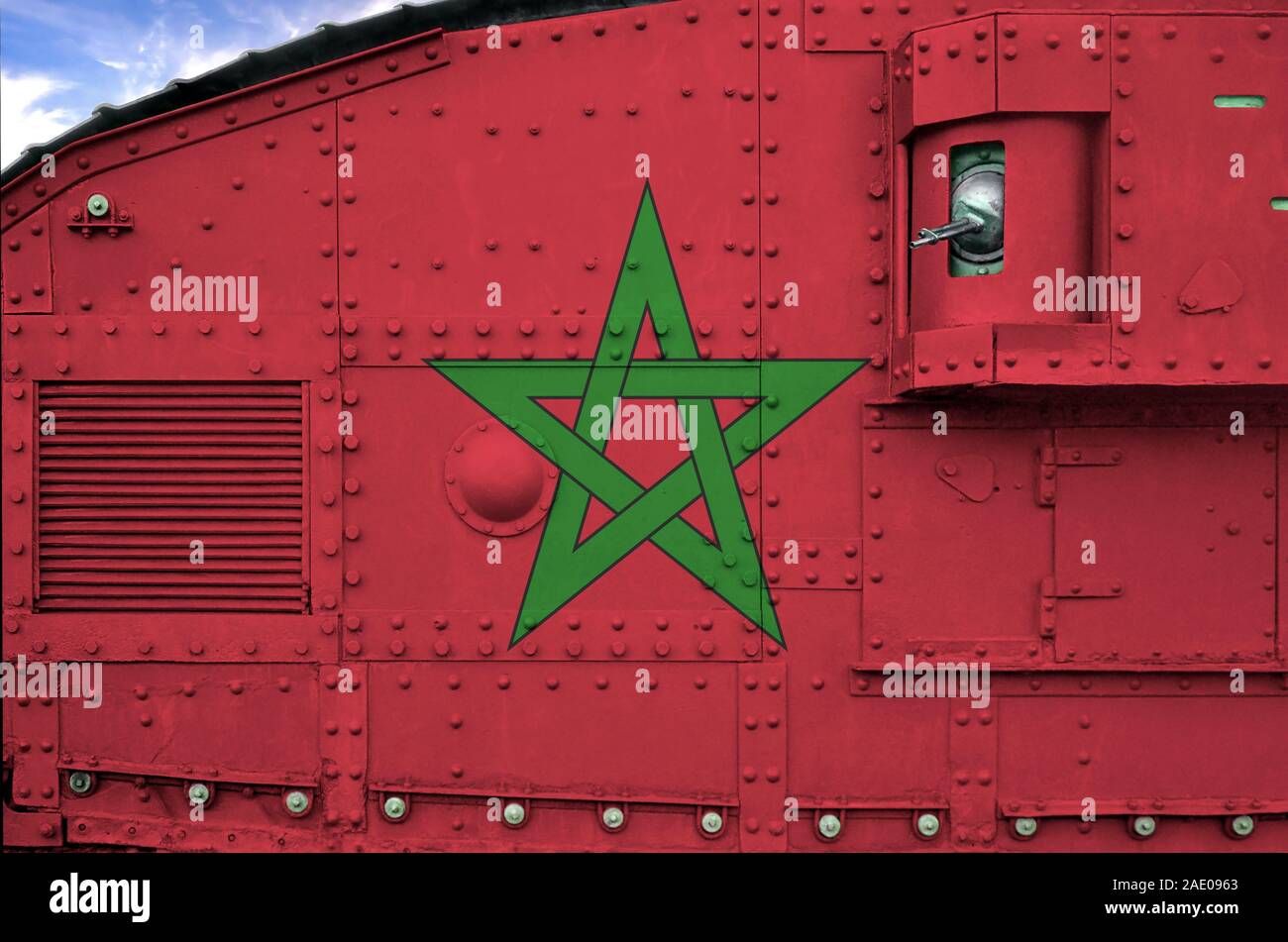 Morocco flag depicted on side part of military armored tank close up ...