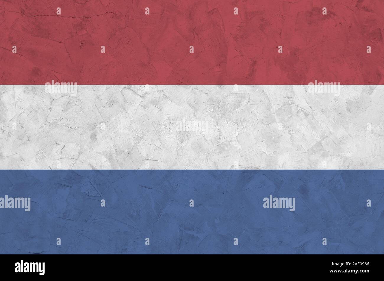 Netherlands flag depicted in bright paint colors on old relief ...