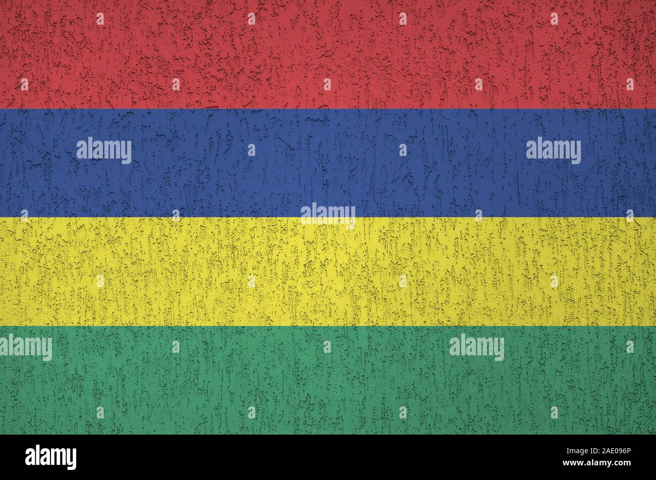 Mauritius flag depicted in bright paint colors on old relief plastering ...