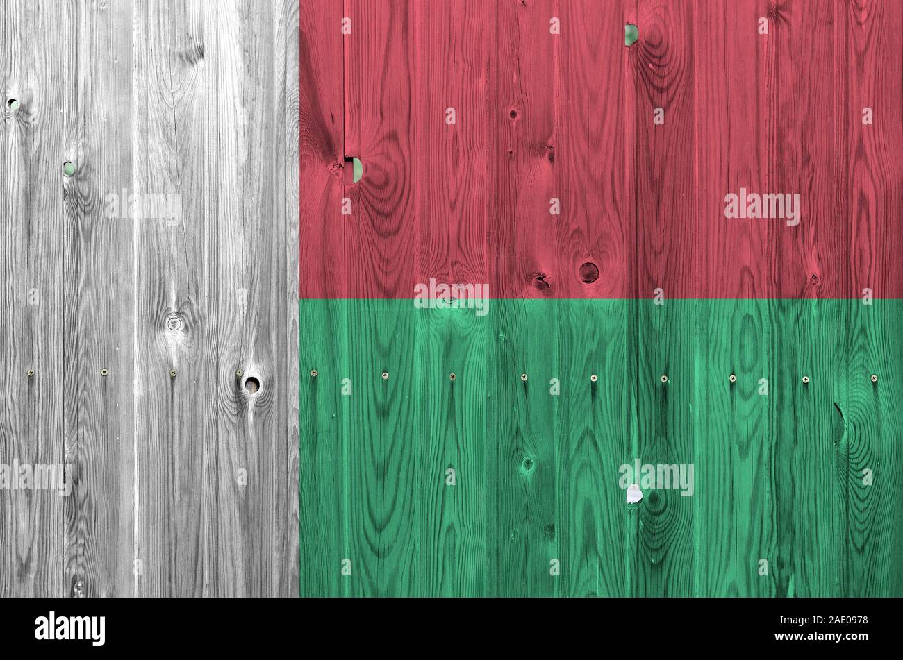 Madagascar flag depicted in bright paint colors on old wooden wall ...