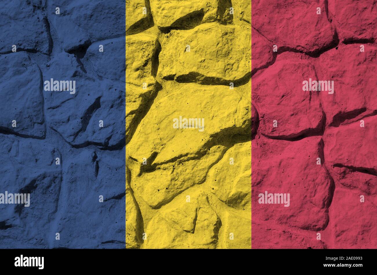 Chad flag depicted in paint colors on old stone wall close up. Textured ...