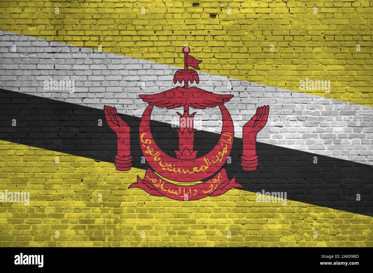Brunei Darussalam flag depicted in paint colors on old brick wall close ...