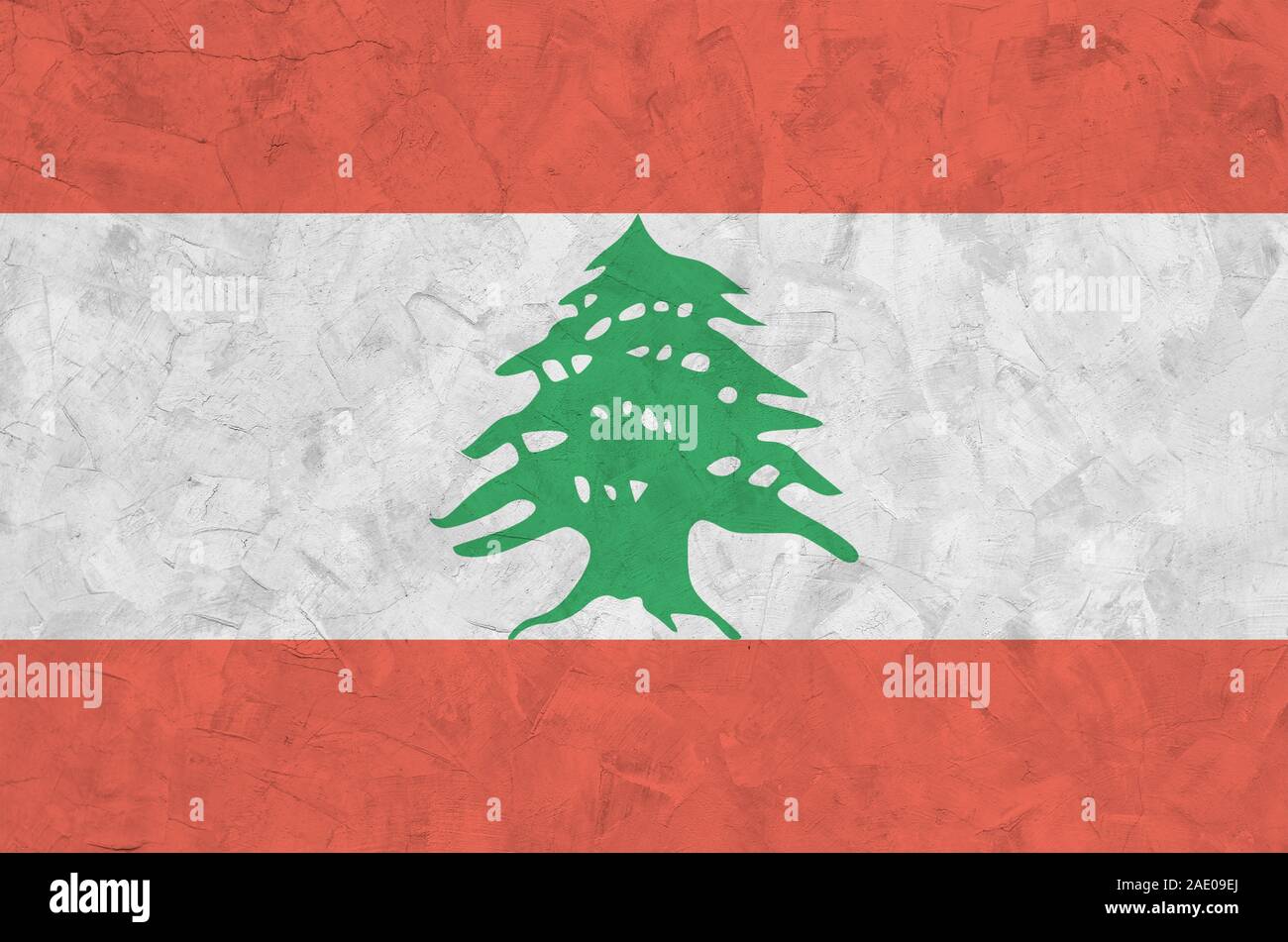 Lebanon flag depicted in bright paint colors on old relief plastering ...