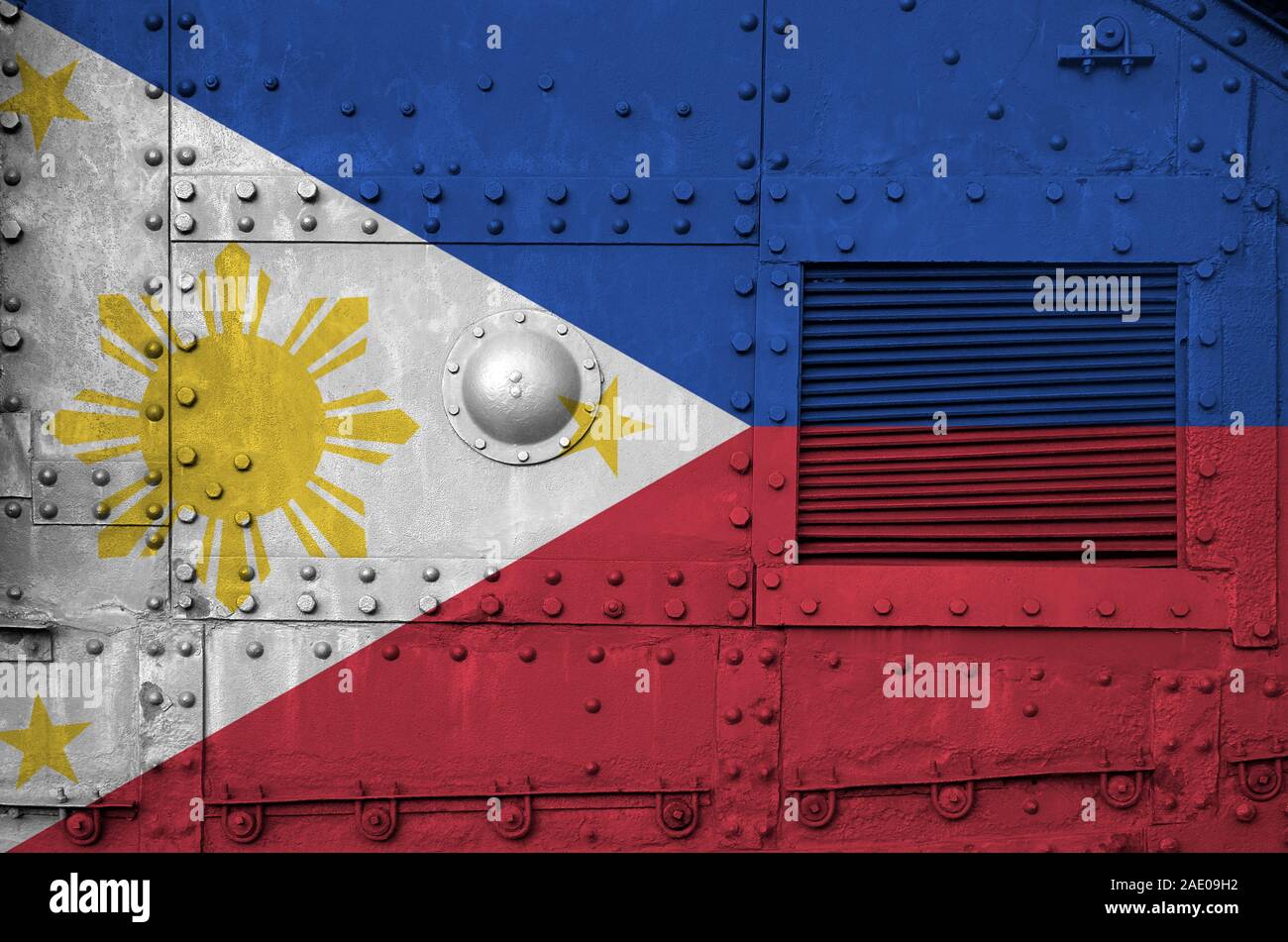 Philippines flag depicted on side part of military armored tank close ...