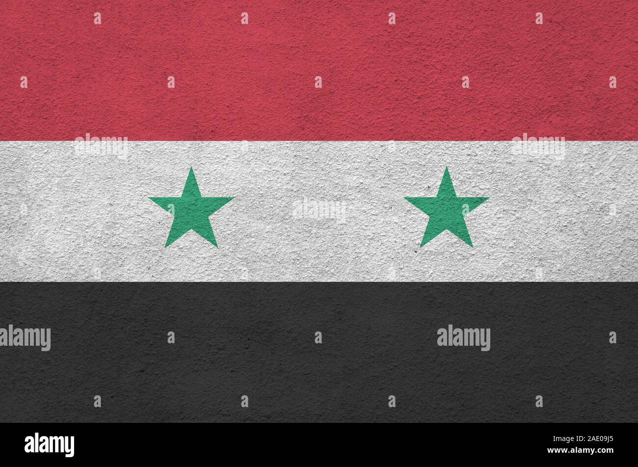 Syria flag depicted in bright paint colors on old relief plastering ...