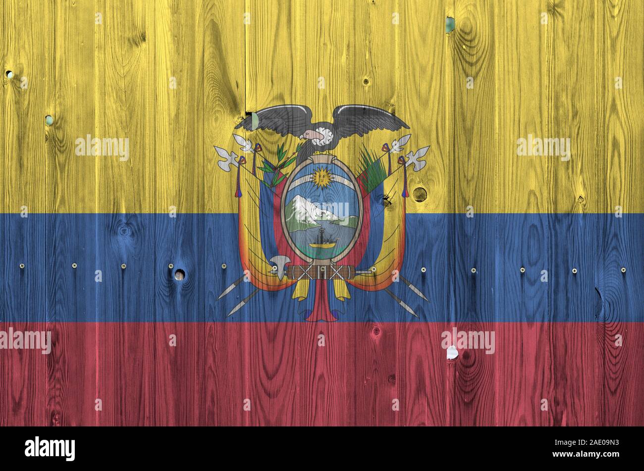 Ecuador flag depicted in bright paint colors on old wooden wall close ...