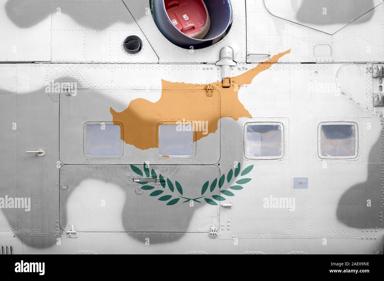 Cyprus flag depicted on side part of military armored helicopter close ...