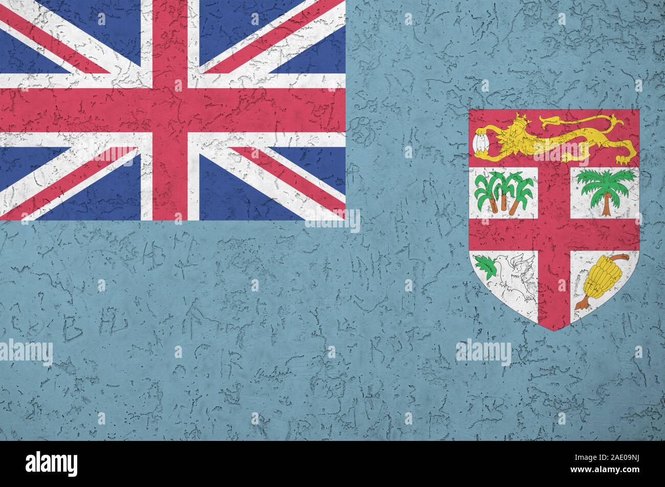Fiji flag depicted in bright paint colors on old relief plastering wall ...