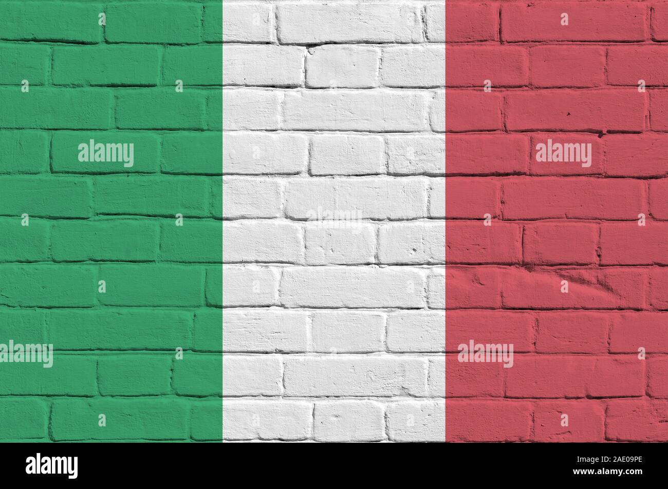 Italy flag depicted in paint colors on old brick wall close up ...