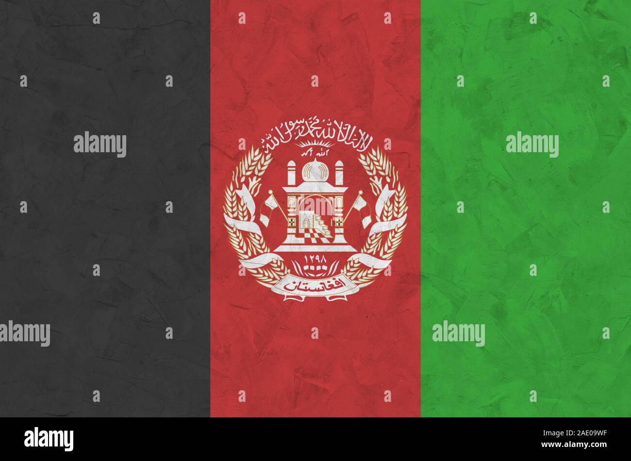Afghanistan flag depicted in bright paint colors on old relief ...