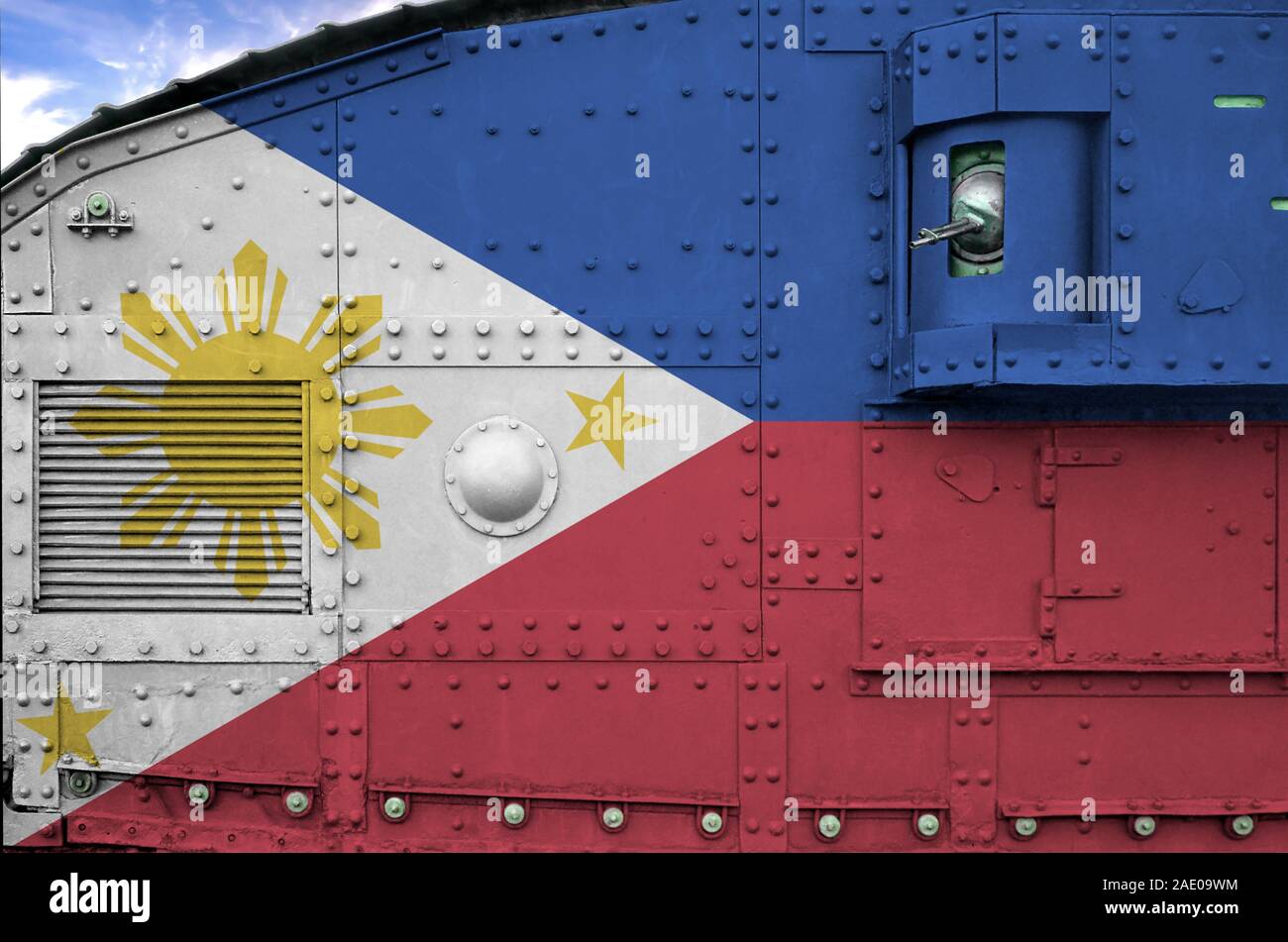 Philippines flag depicted on side part of military armored tank close ...
