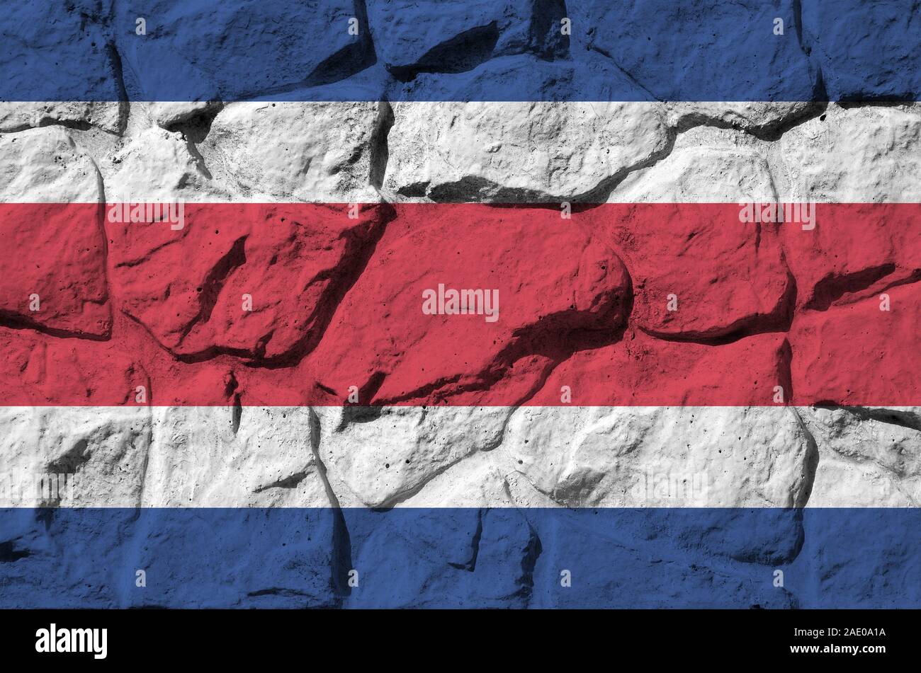 Costa Rica flag depicted in paint colors on old stone wall close up ...