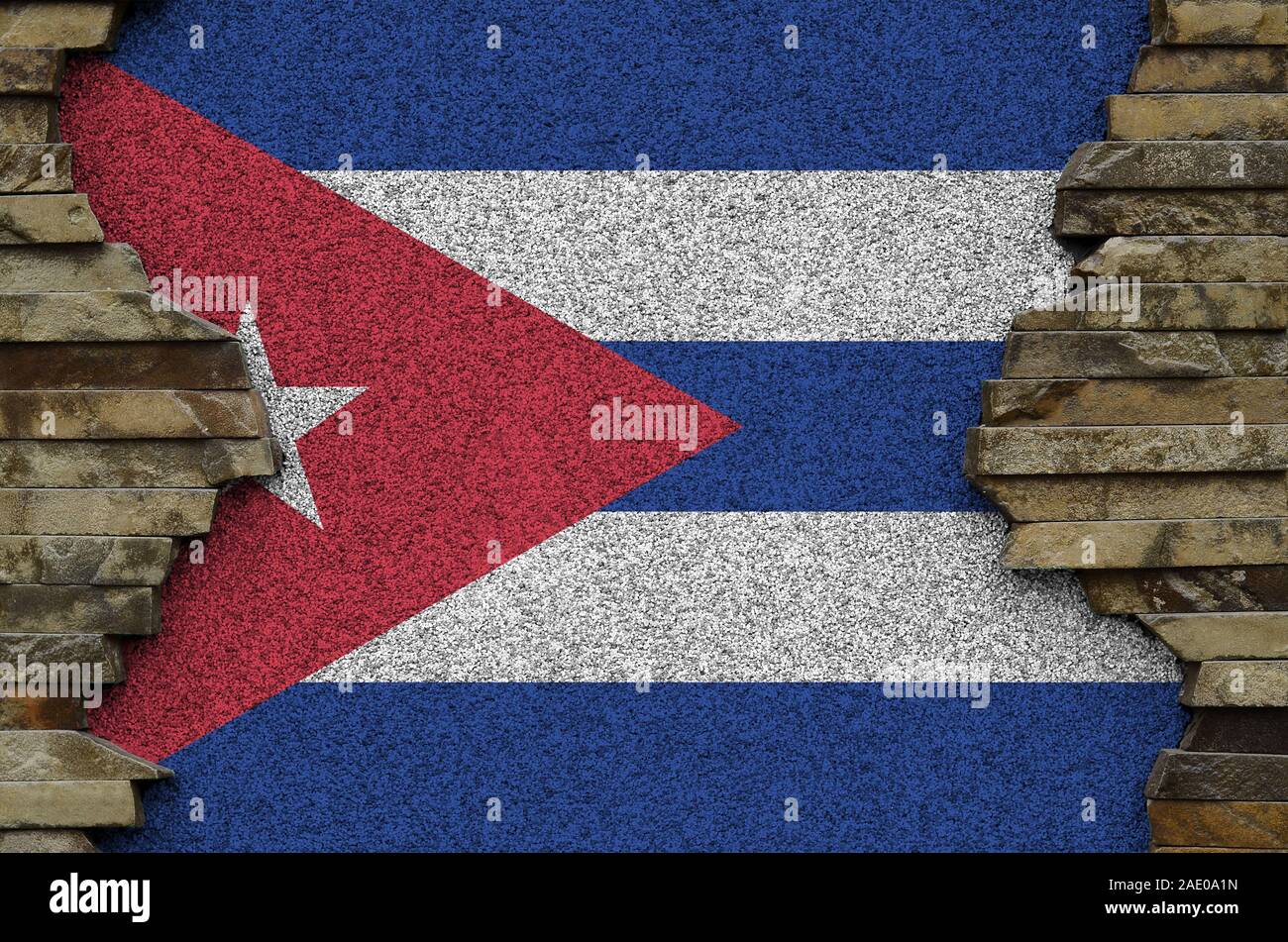 Cuba flag depicted in paint colors on old stone wall close up. Textured ...