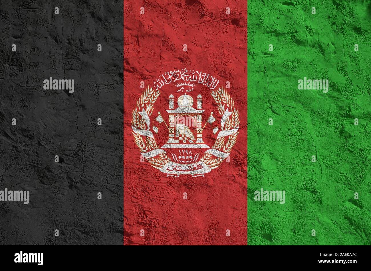 Afghanistan flag depicted in bright paint colors on old relief ...