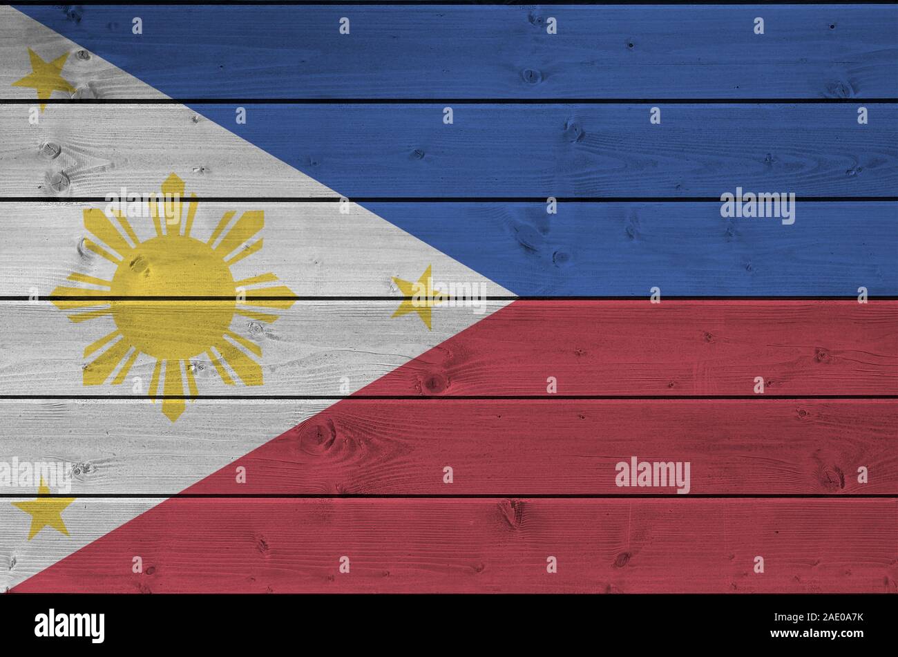 Philippines flag depicted in bright paint colors on old wooden wall ...