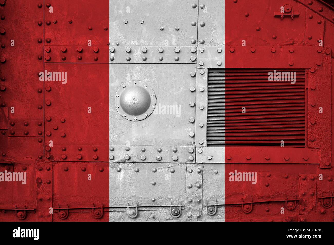 Peru flag depicted on side part of military armored tank close up. Army ...