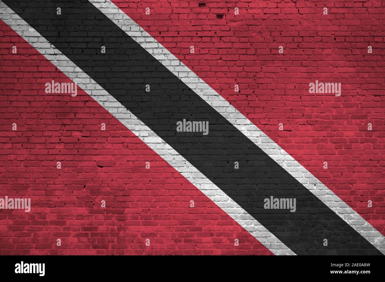 Trinidad and Tobago flag depicted in paint colors on old brick wall ...