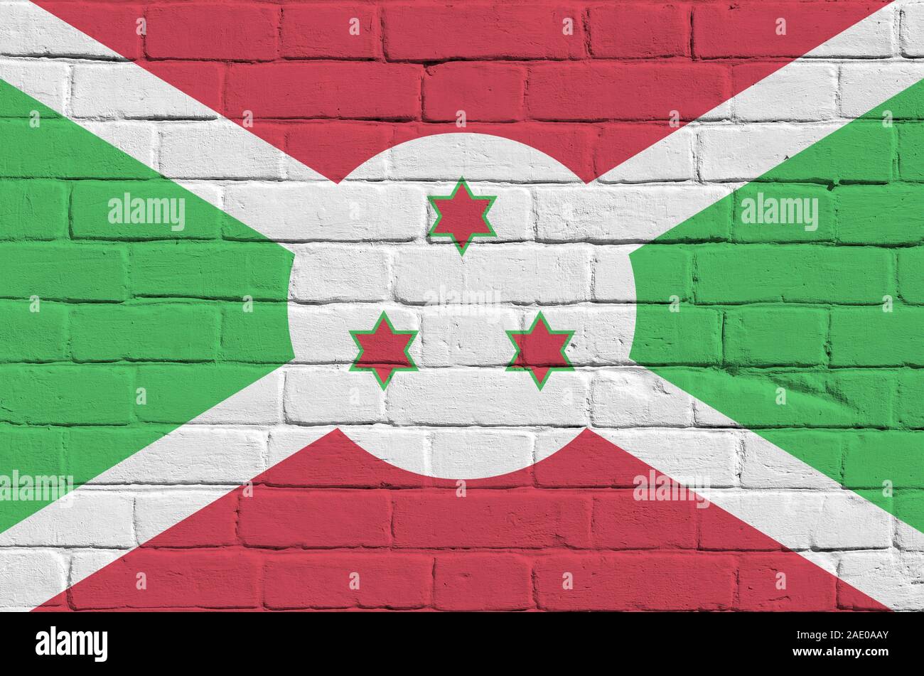 Burundi flag depicted in paint colors on old brick wall close up ...