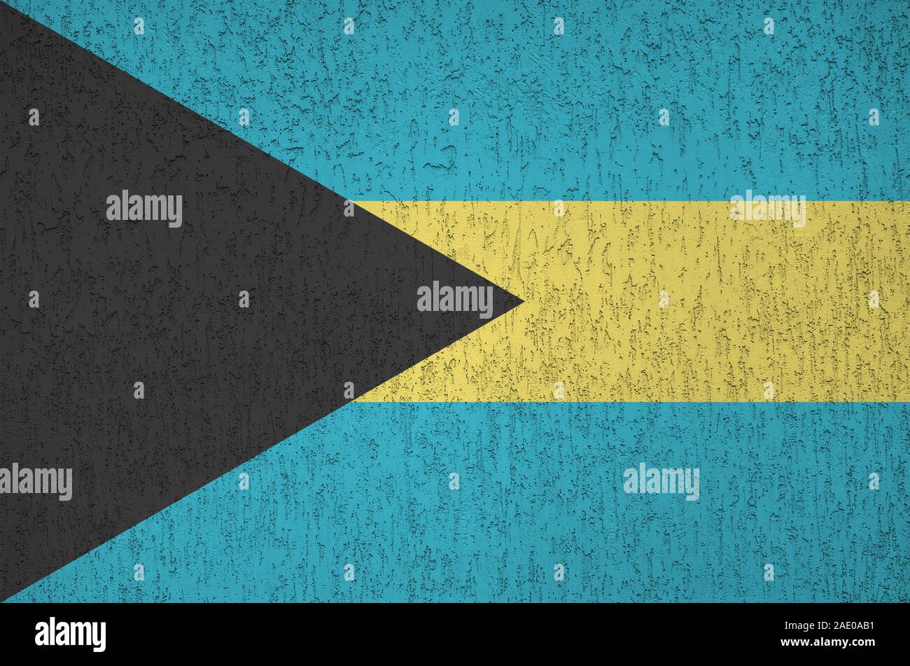 Bahamas flag depicted in bright paint colors on old relief plastering ...
