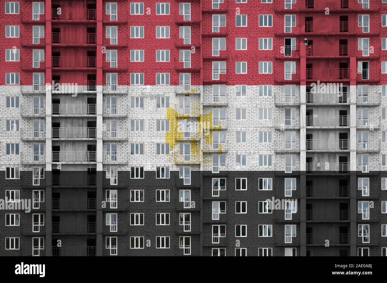 Egypt flag depicted in paint colors on multi-storey residental building ...