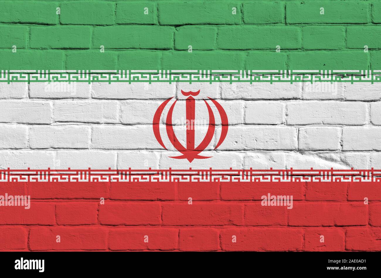 Iran flag depicted in paint colors on old brick wall close up. Textured ...