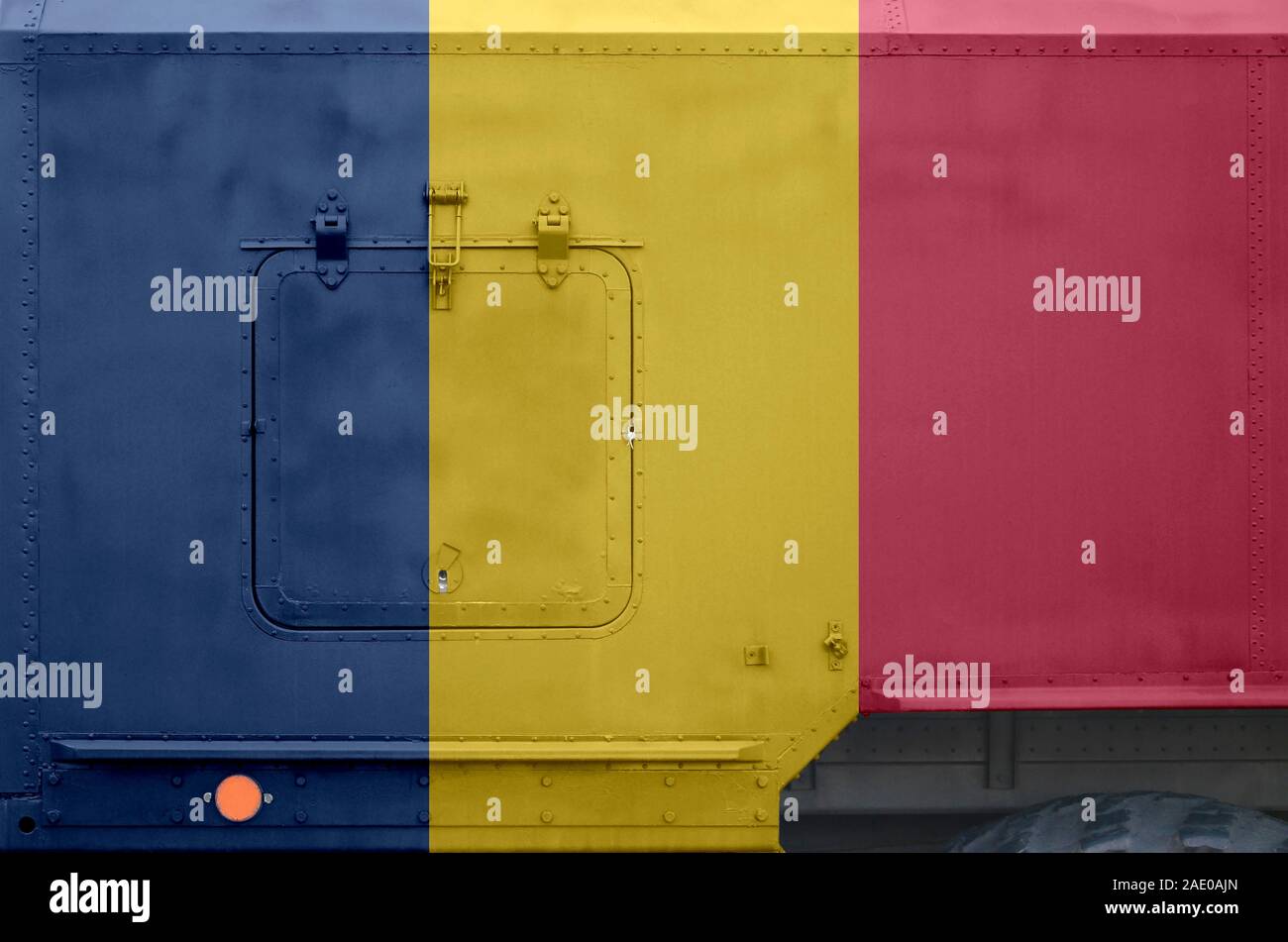 Chad flag depicted on side part of military armored truck close up ...