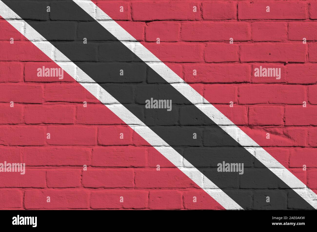 Trinidad and Tobago flag depicted in paint colors on old brick wall ...