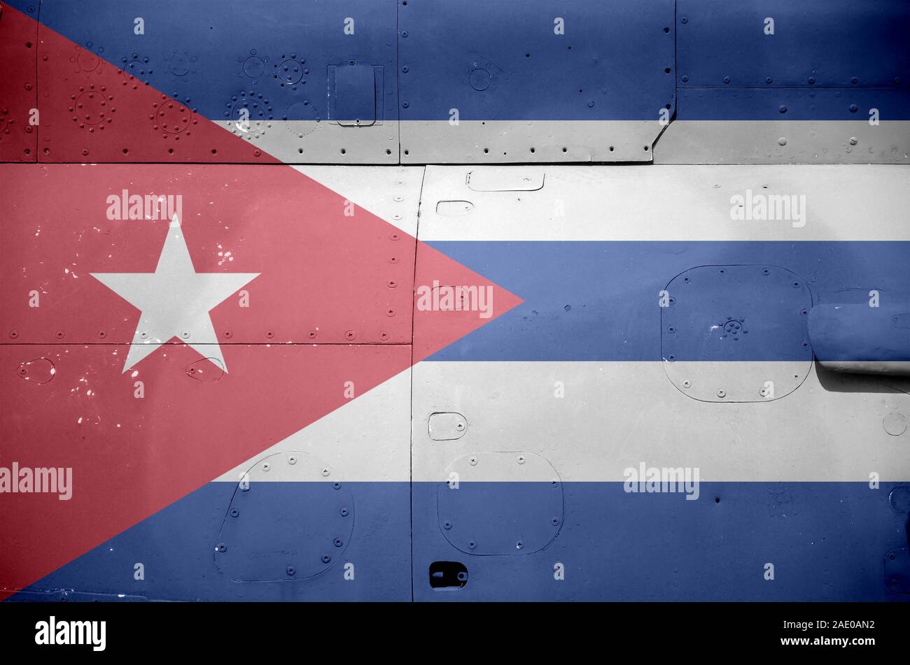 Cuba flag depicted on side part of military armored helicopter close up ...