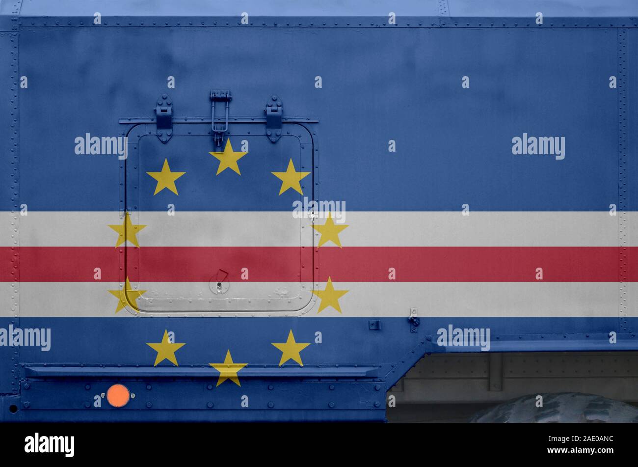 Cabo verde flag depicted on side part of military armored truck close ...
