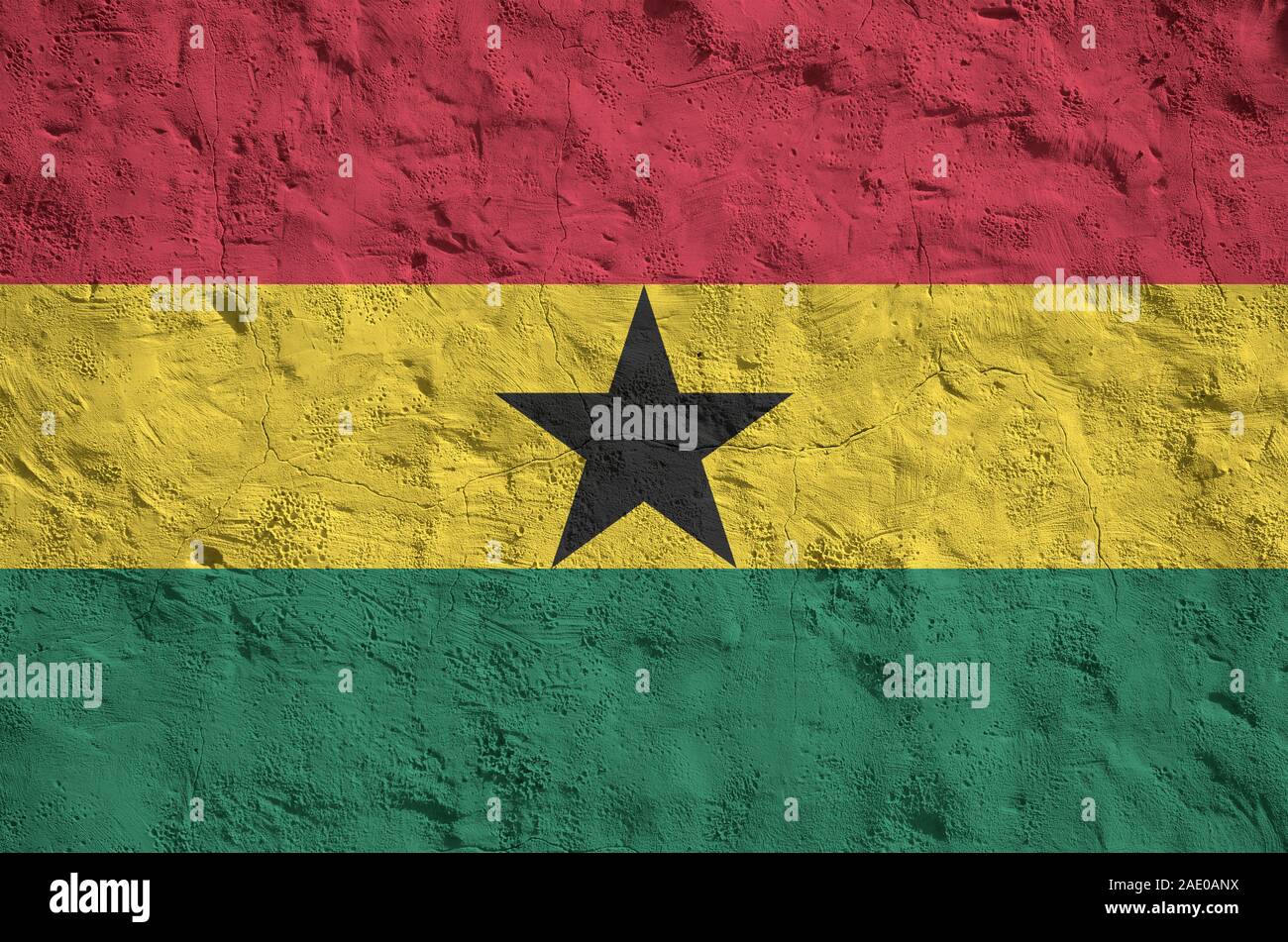 Ghana flag depicted in bright paint colors on old relief plastering ...
