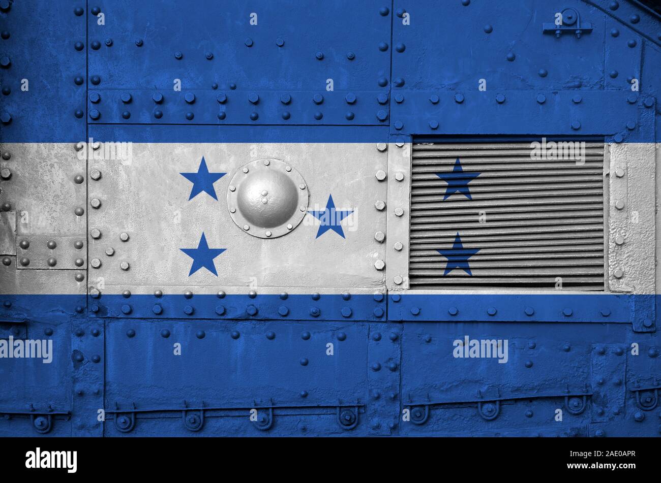 Honduras flag depicted on side part of military armored tank close up ...