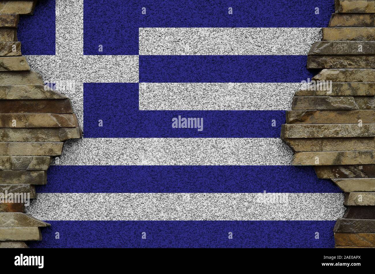 Greece flag depicted in paint colors on old stone wall close up ...