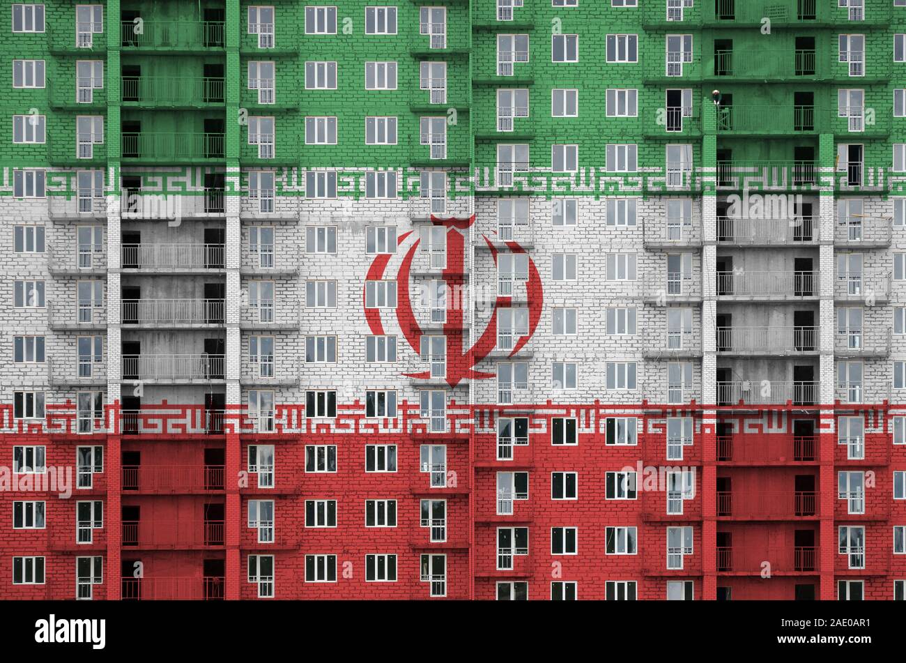 Iran flag depicted in paint colors on multi-storey residental building ...