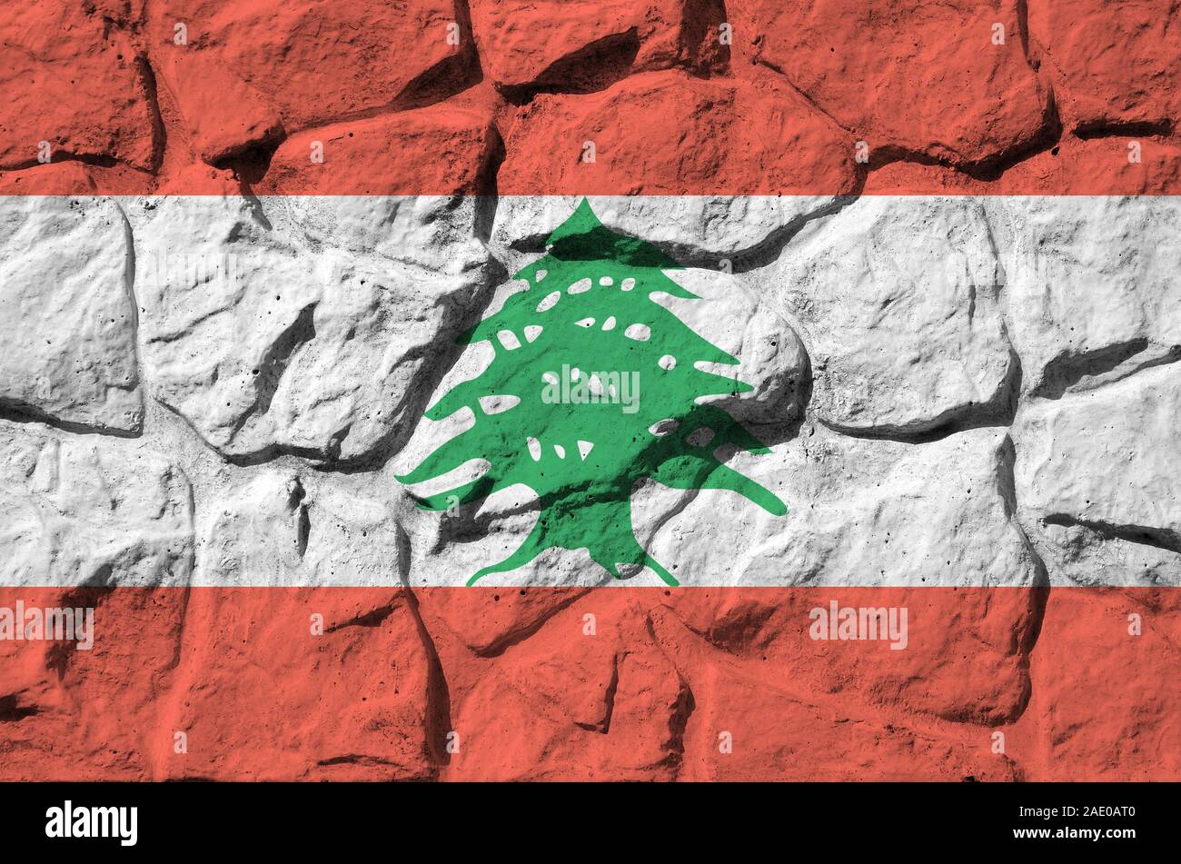 Lebanon flag depicted in paint colors on old stone wall close up ...