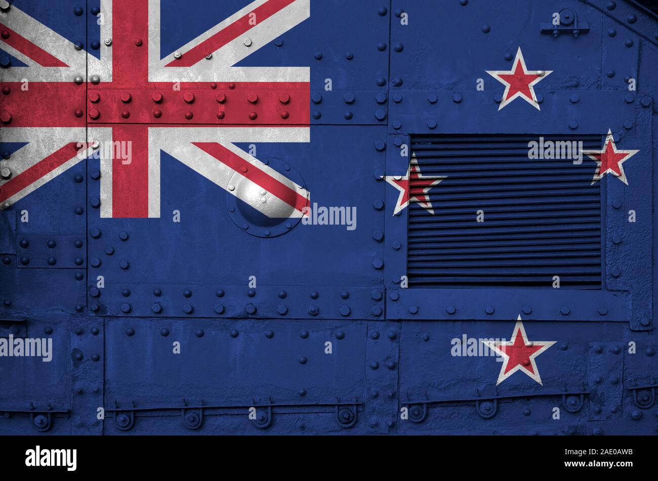 New Zealand flag depicted on side part of military armored tank close ...