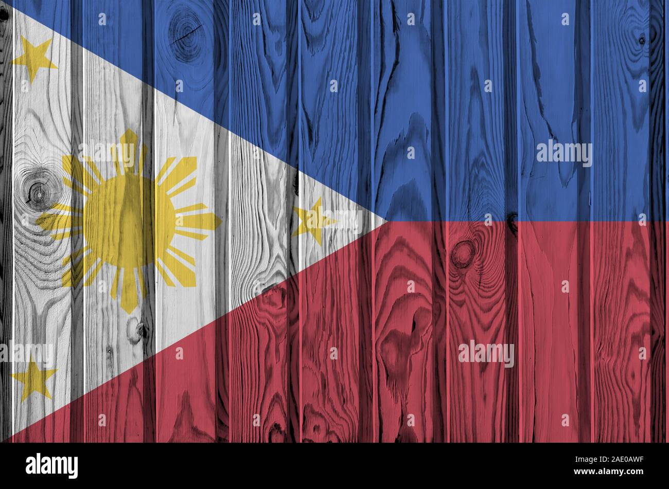 Philippines flag depicted in bright paint colors on old wooden wall ...