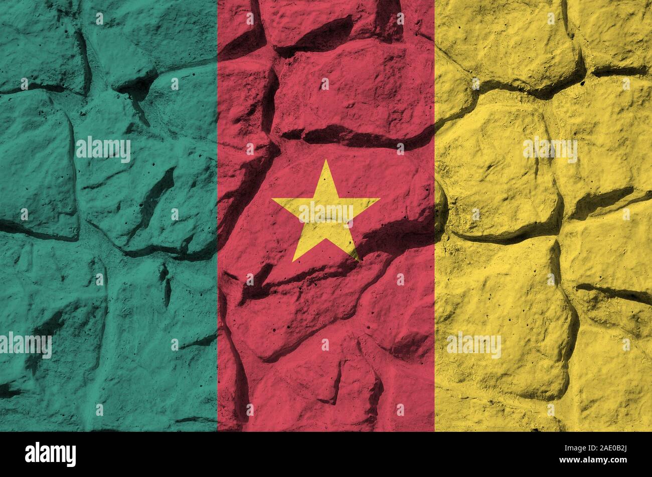 Cameroon flag depicted in paint colors on old stone wall close up ...