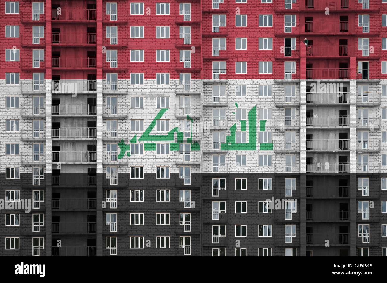 Iraq flag depicted in paint colors on multi-storey residental building ...