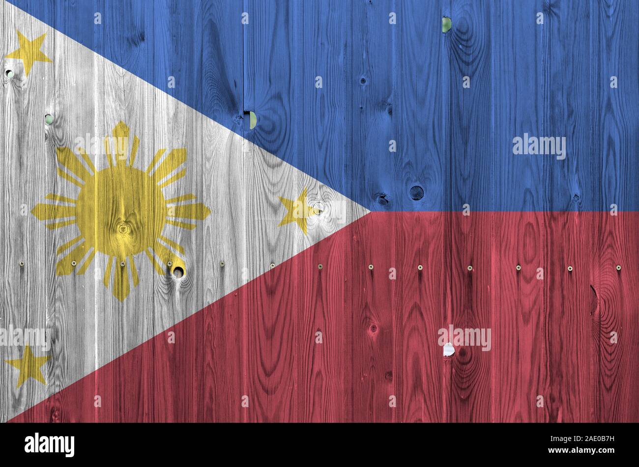 Philippines flag depicted in bright paint colors on old wooden wall ...