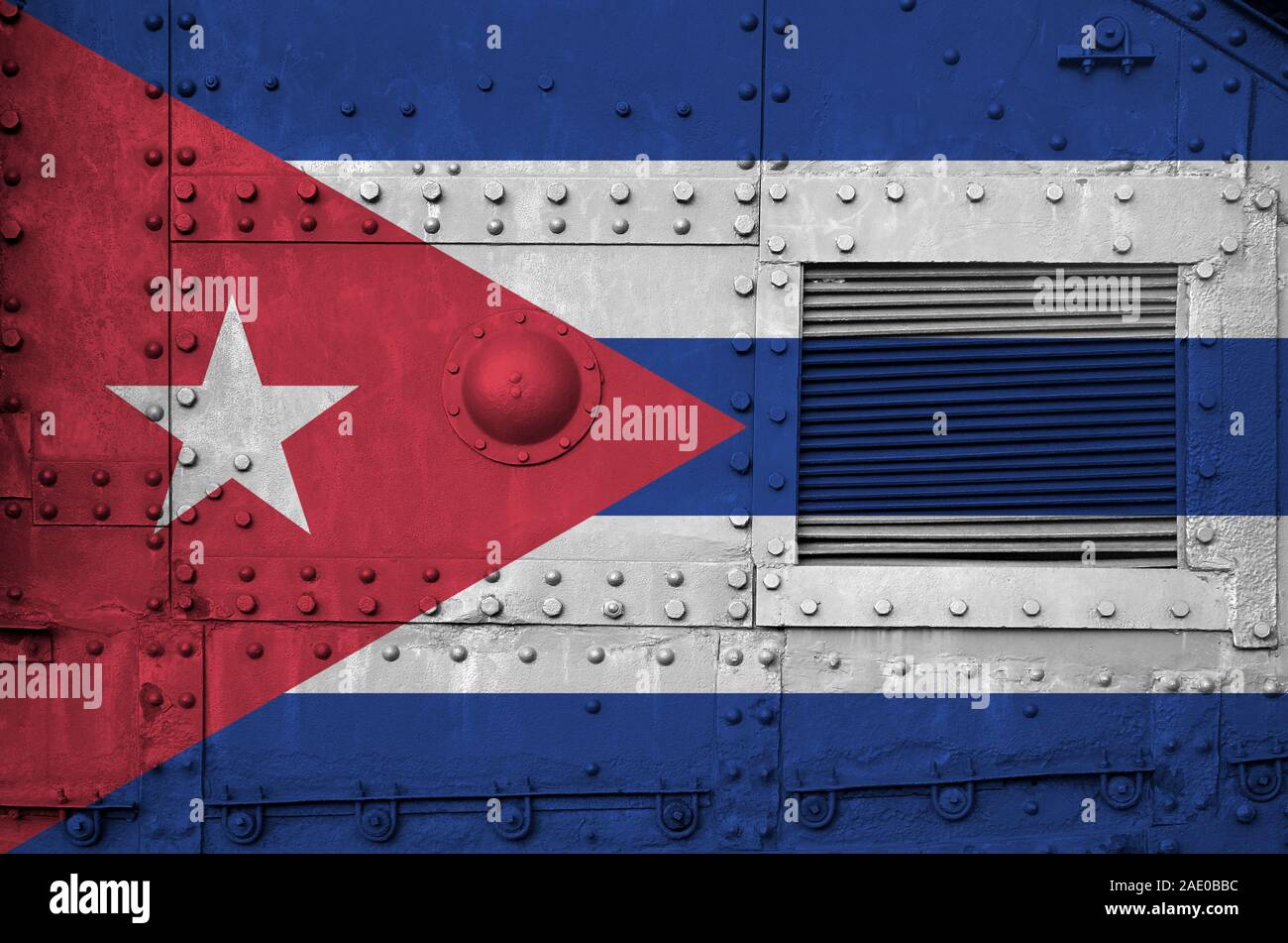 Cuba flag depicted on side part of military armored tank close up. Army ...
