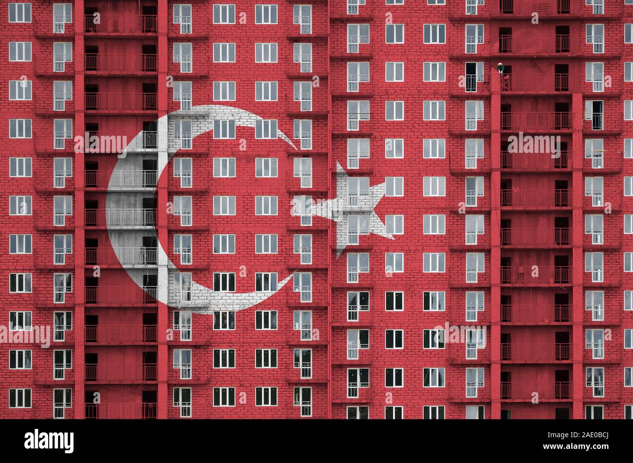 Turkey flag depicted in paint colors on multi-storey residental ...