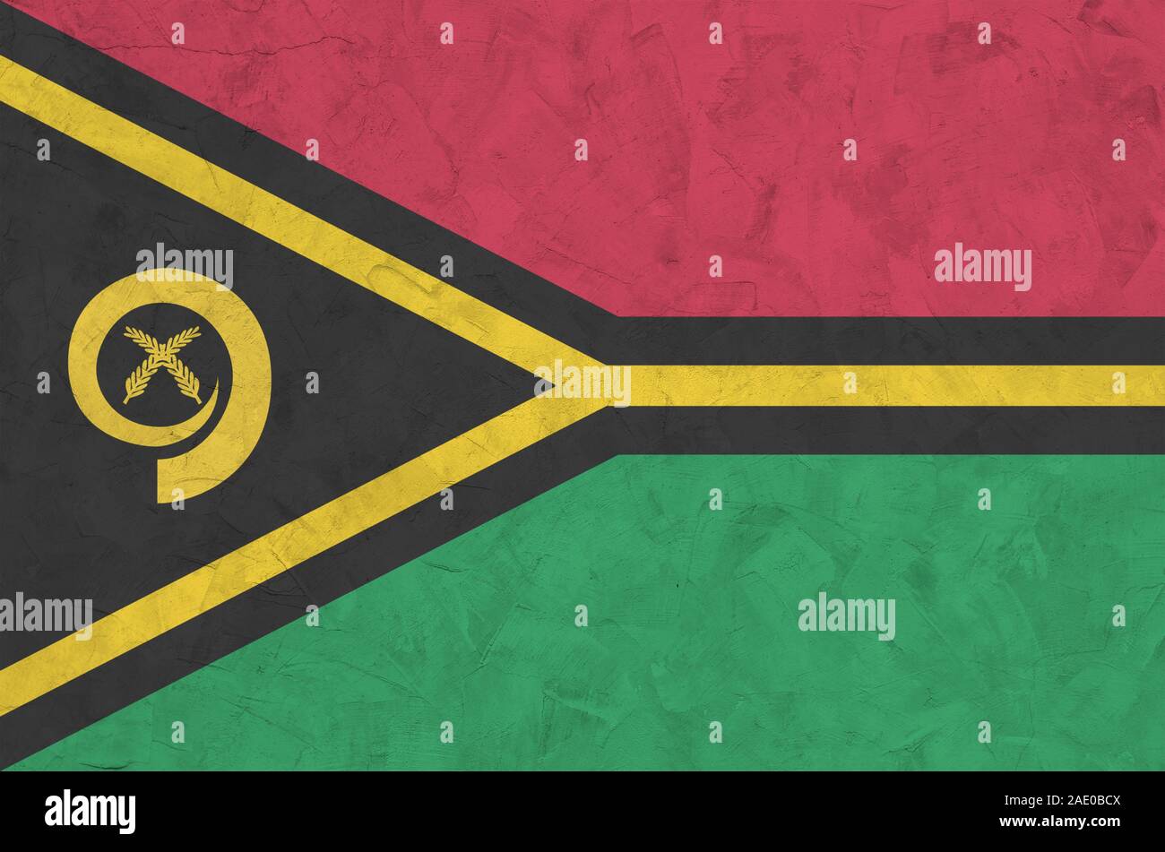Vanuatu flag depicted in bright paint colors on old relief plastering ...