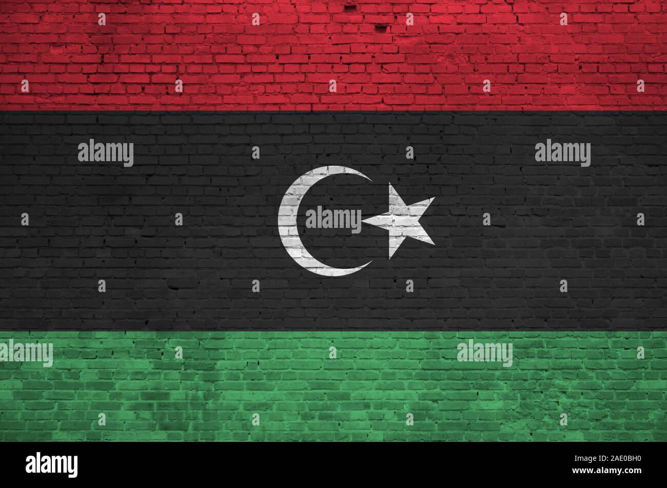 Libya flag depicted in paint colors on old brick wall close up ...