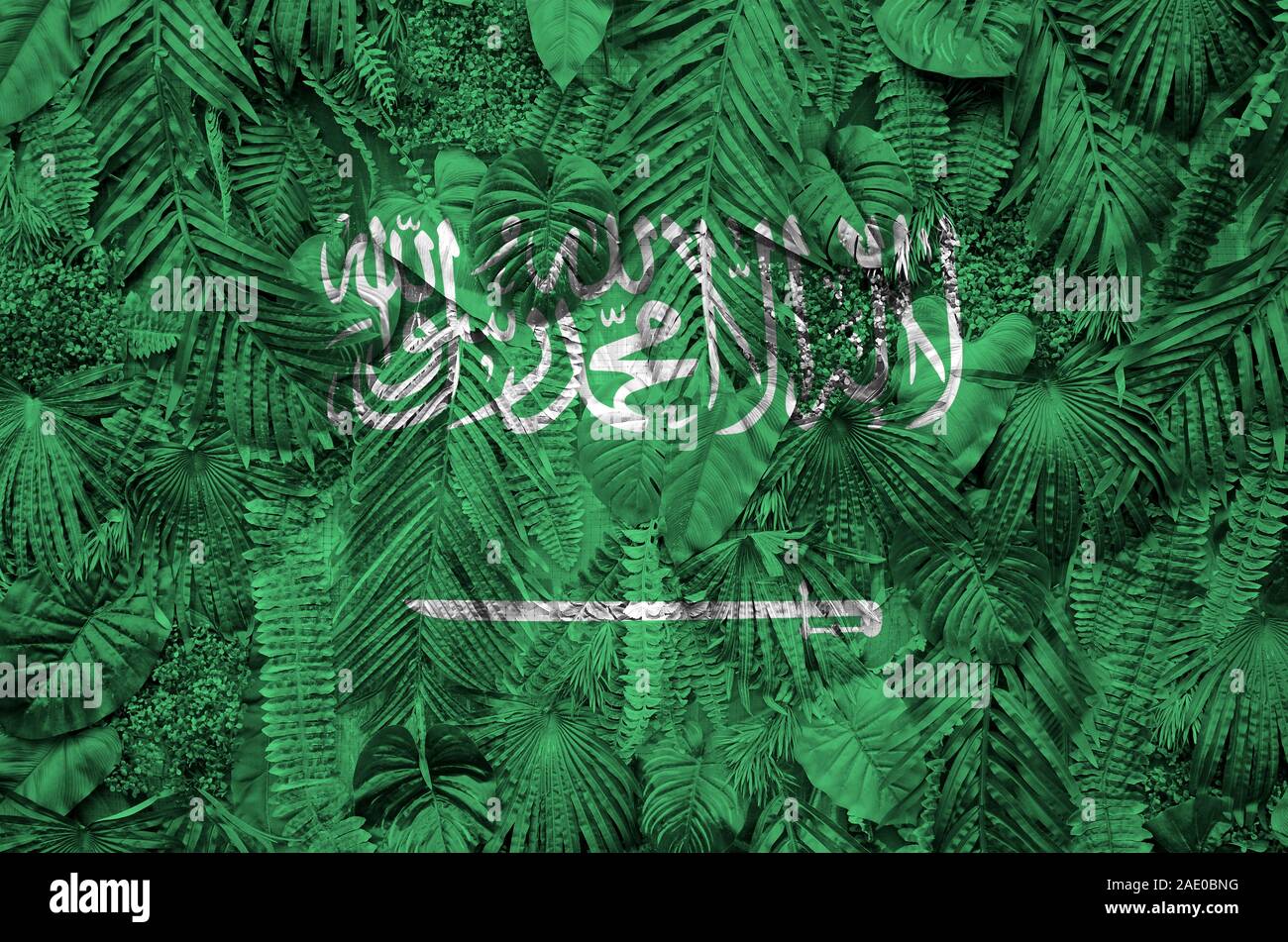 Saudi Arabia flag depicted on many leafs of monstera palm trees. Trendy ...